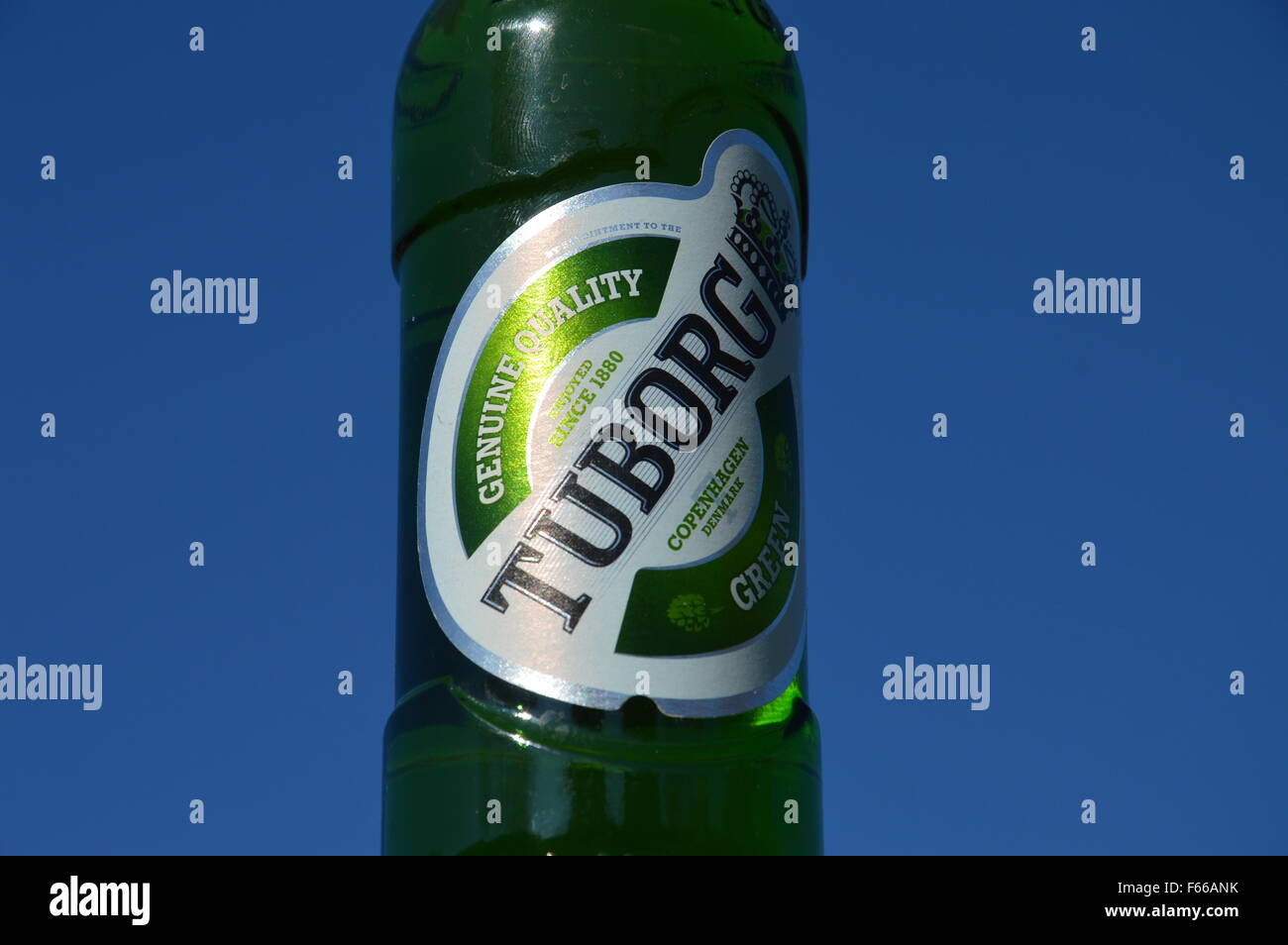 bottle brand beer of the produced in Denmark of the backgrounds blue ...