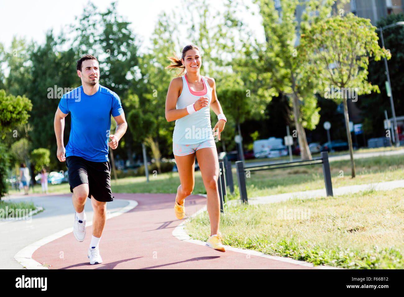Man woman running together on hi-res stock photography and images - Alamy