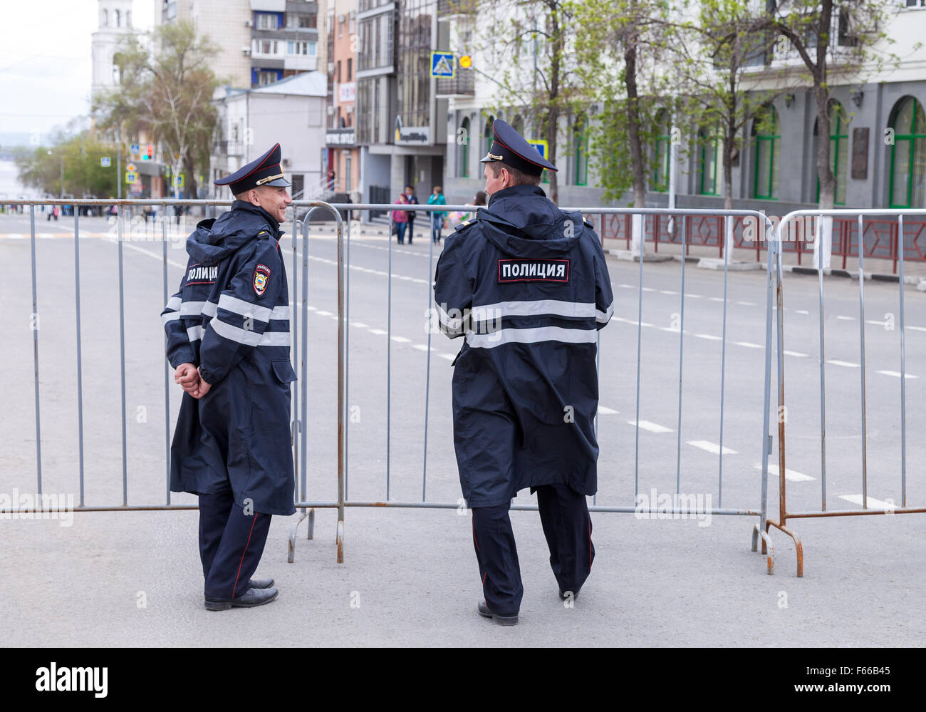 Police patrol at the central street in summer day Stock Photo - Alamy
