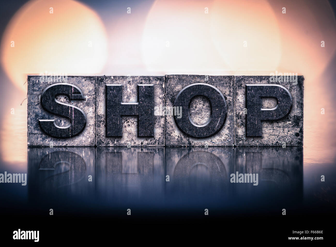 The word "SHOP" written in vintage ink stained letterpress type Stock ...
