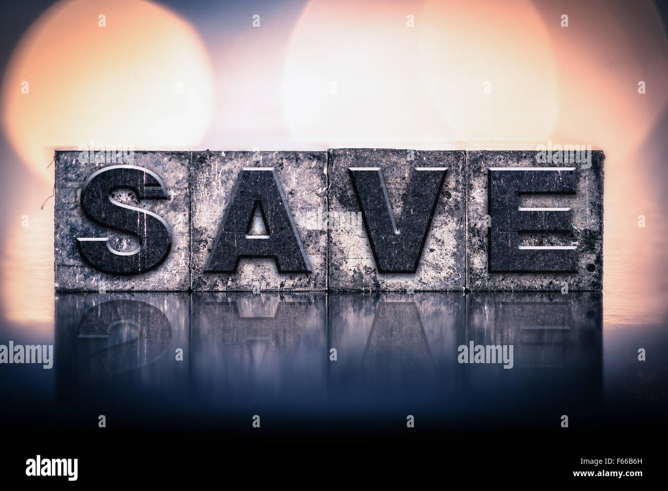 The word "SAVE" written in vintage ink stained letterpress type Stock ...