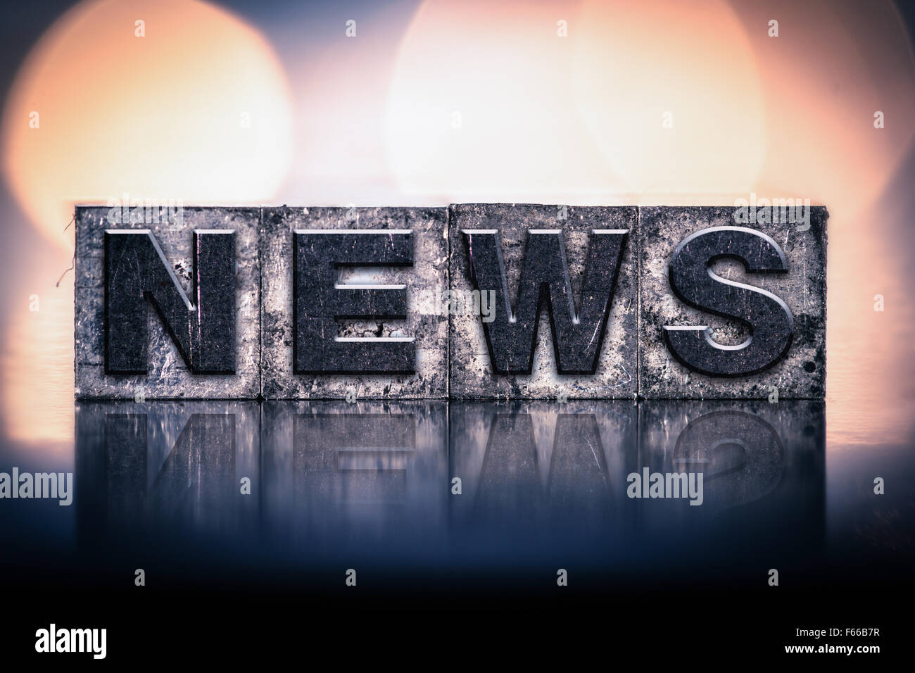 The word "NEWS" written in vintage ink stained letterpress type Stock ...