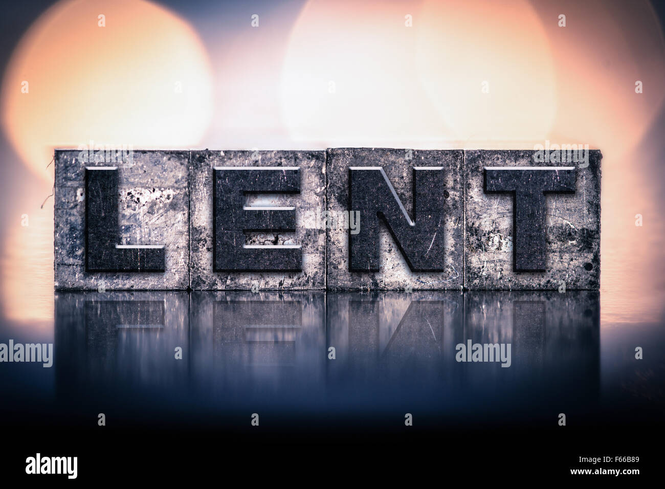 The word "LENT" written in vintage ink stained letterpress type Stock ...