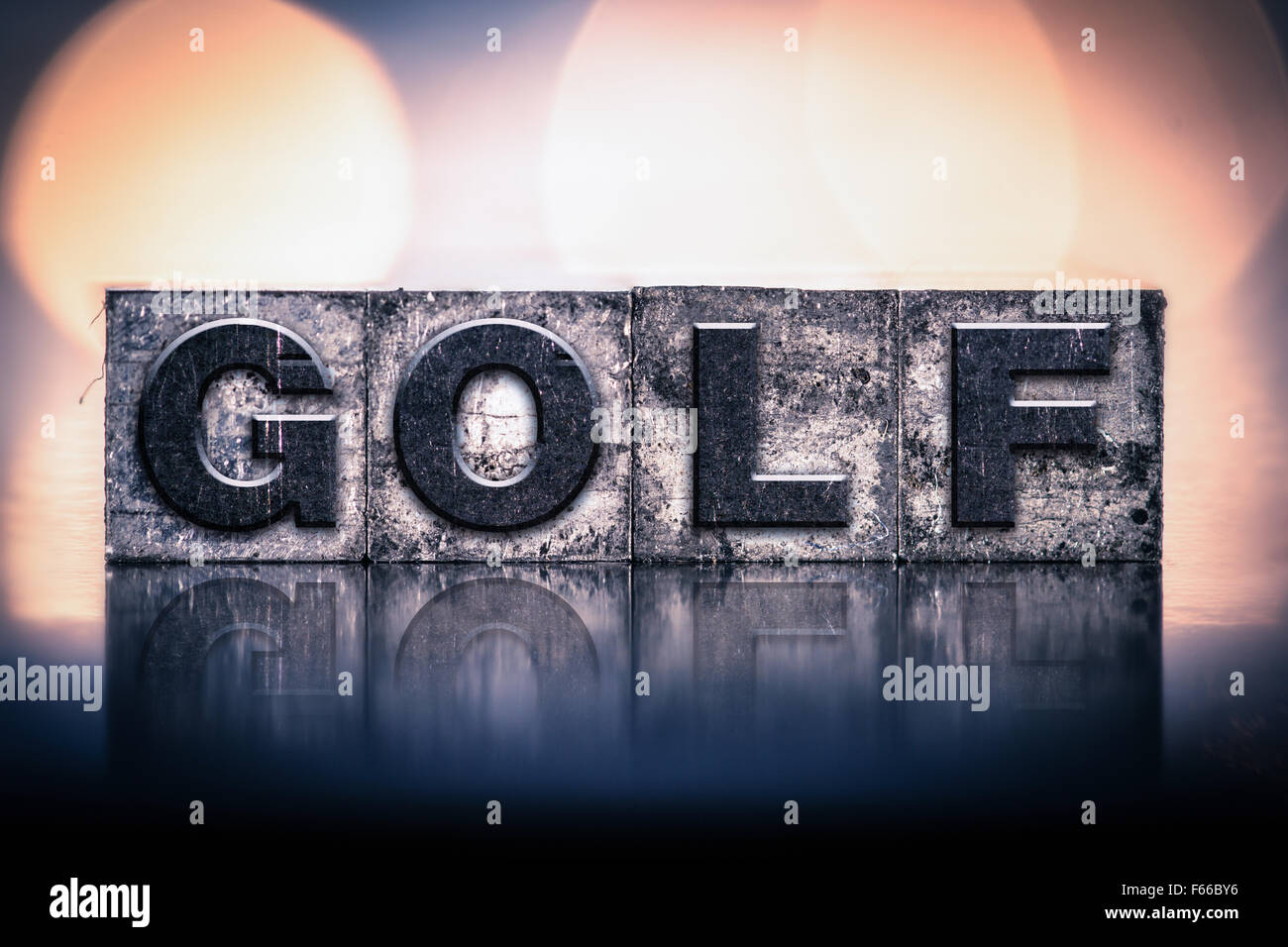 The word "GOLF" written in vintage ink stained letterpress type Stock ...