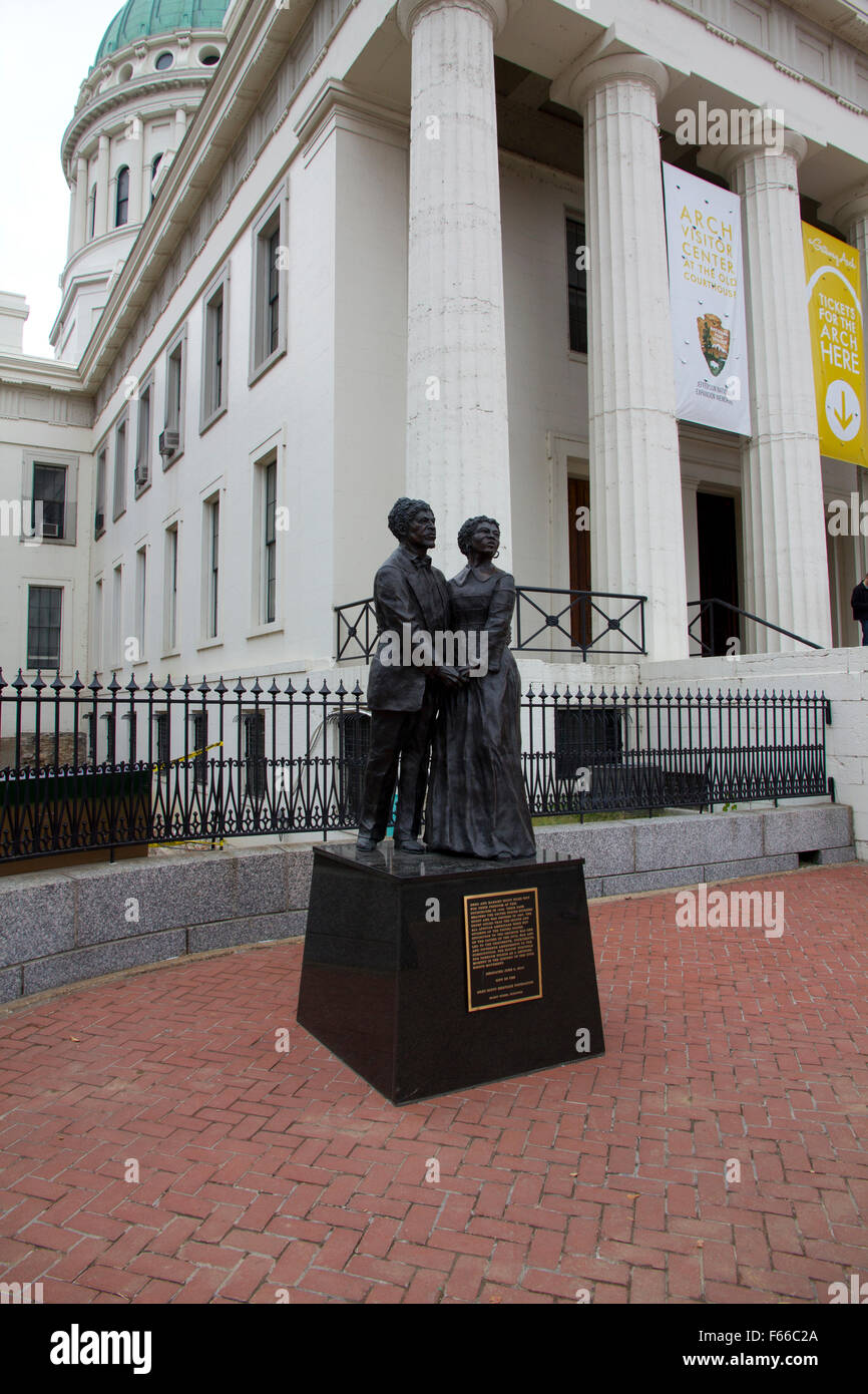 A sculpture memorializing Dred and Harriet Scott stands in front of the ...