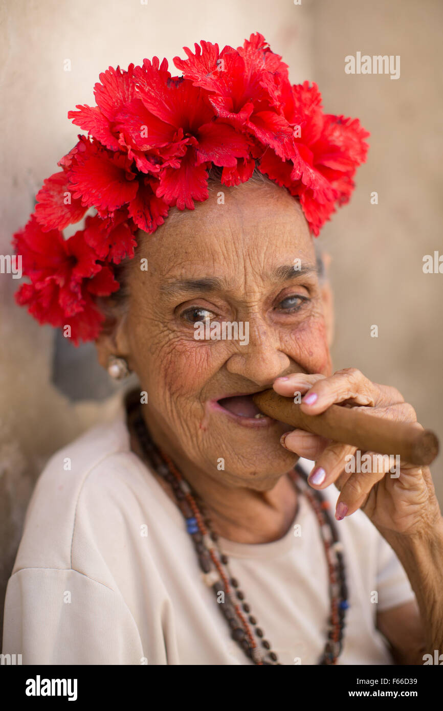 Beautiful old woman with a cigar in Havana, Cuba Stock Photo - Alamy