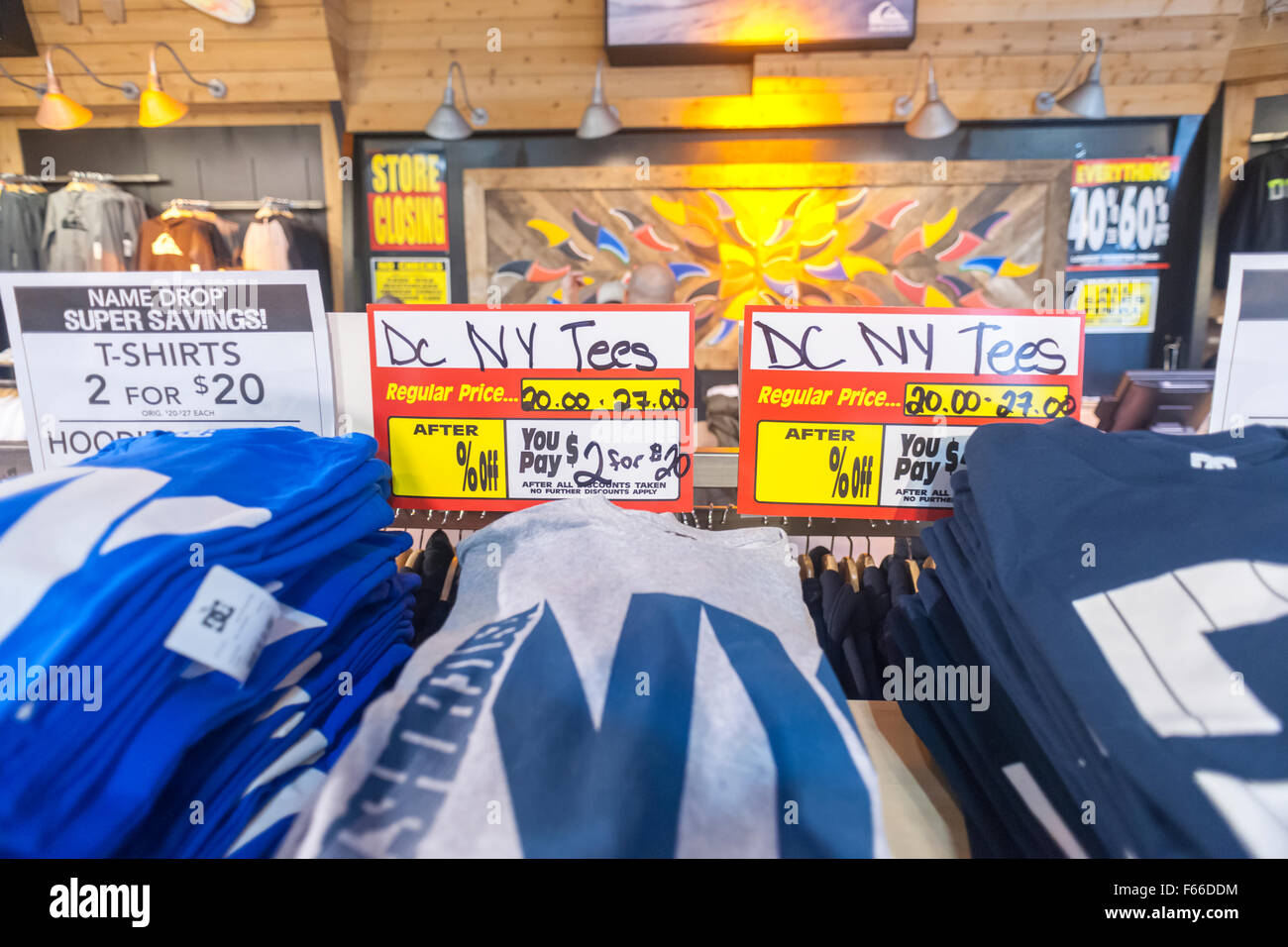 Big discounts on merchandise and fixtures are advertised in the ...