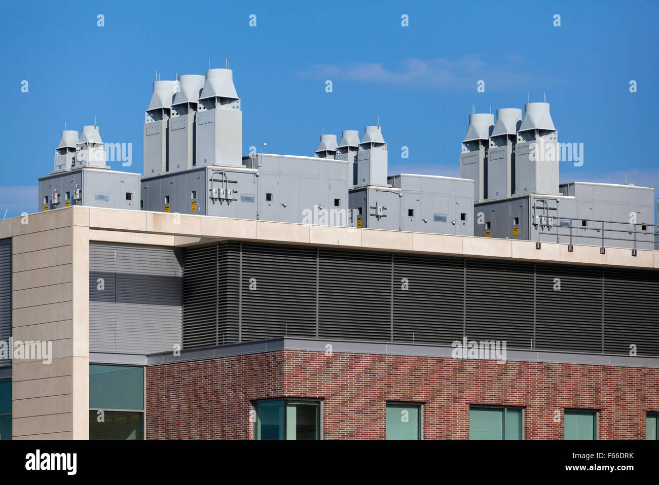 Fancy smokestacks on top of a building Stock Photo - Alamy