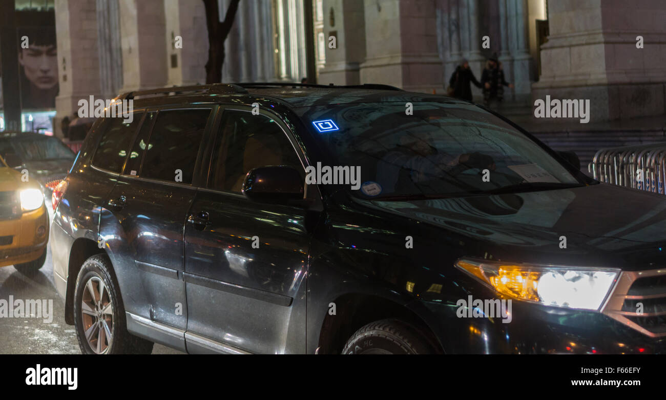 An Uber livery travels through Midtown Manhattan in New York on Tuesday ...