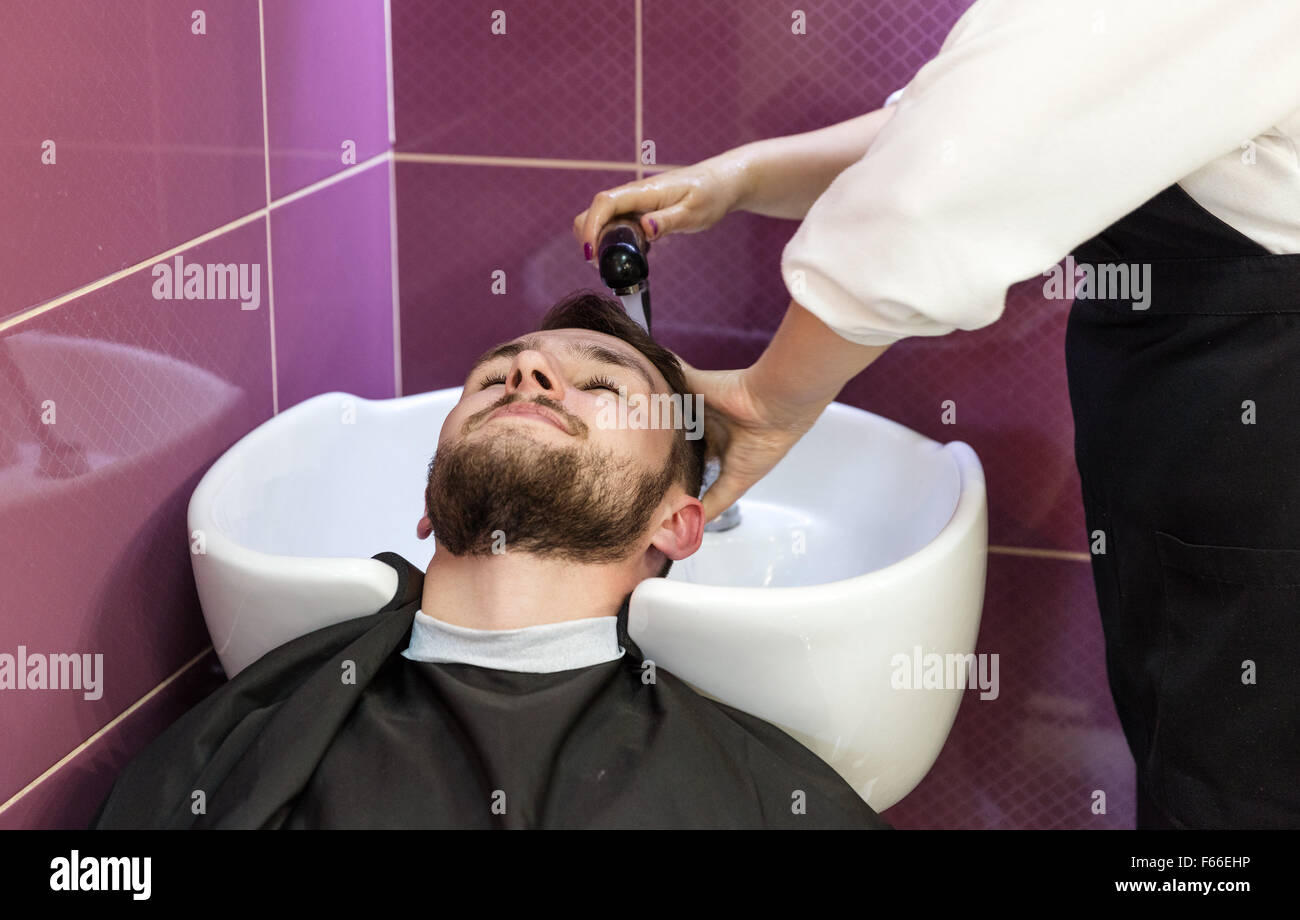 Man having hair washed in hi-res stock photography and images - Alamy