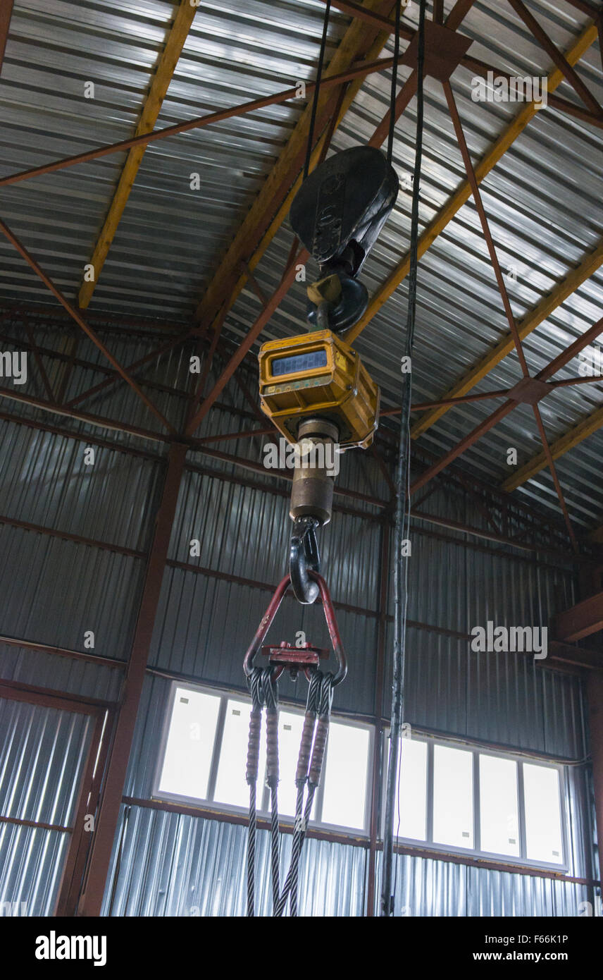 Crane hook in factory warehouse Stock Photo - Alamy