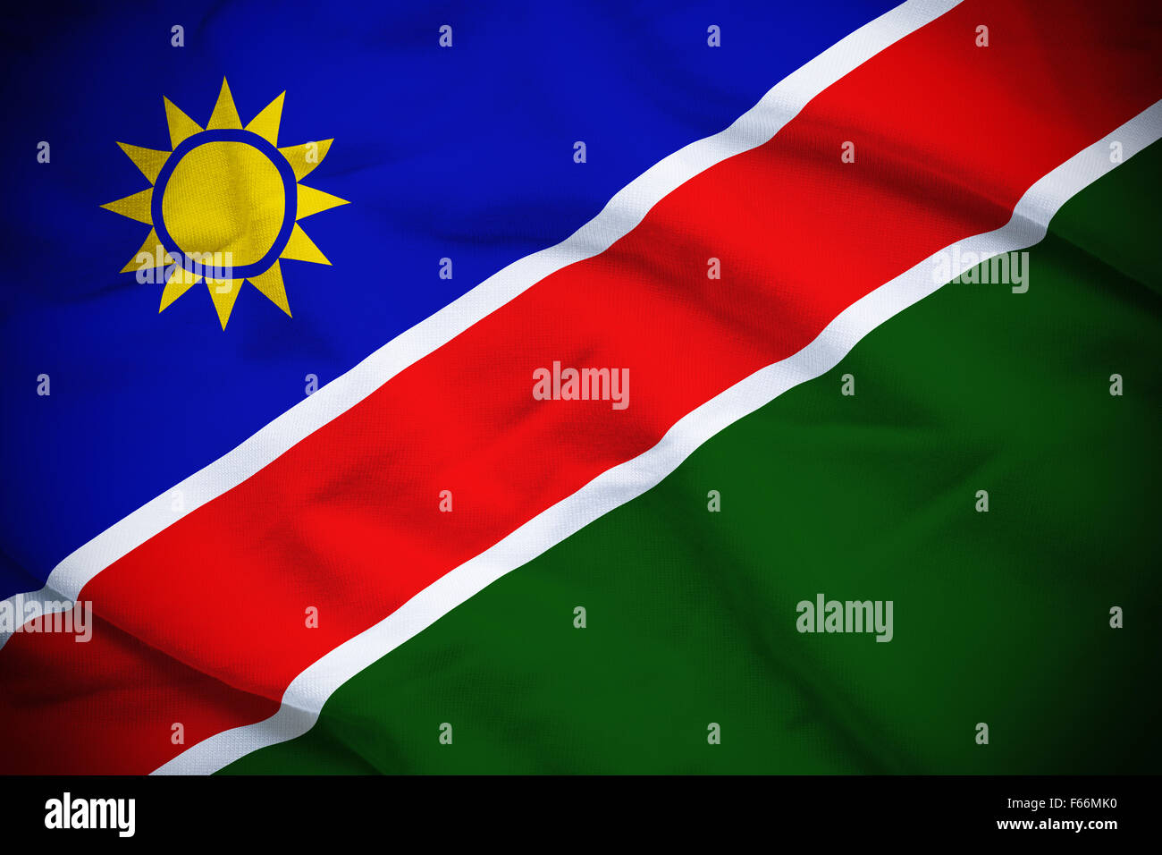 Wavy and rippled national flag of Namibia background Stock Photo - Alamy