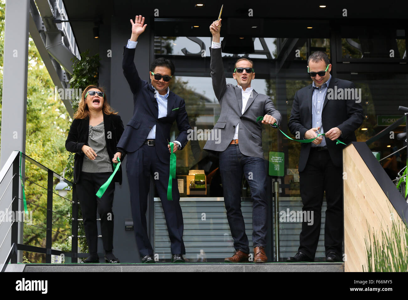 Shake Shack CEO Randy Garutti (third from left) attends the opening ...