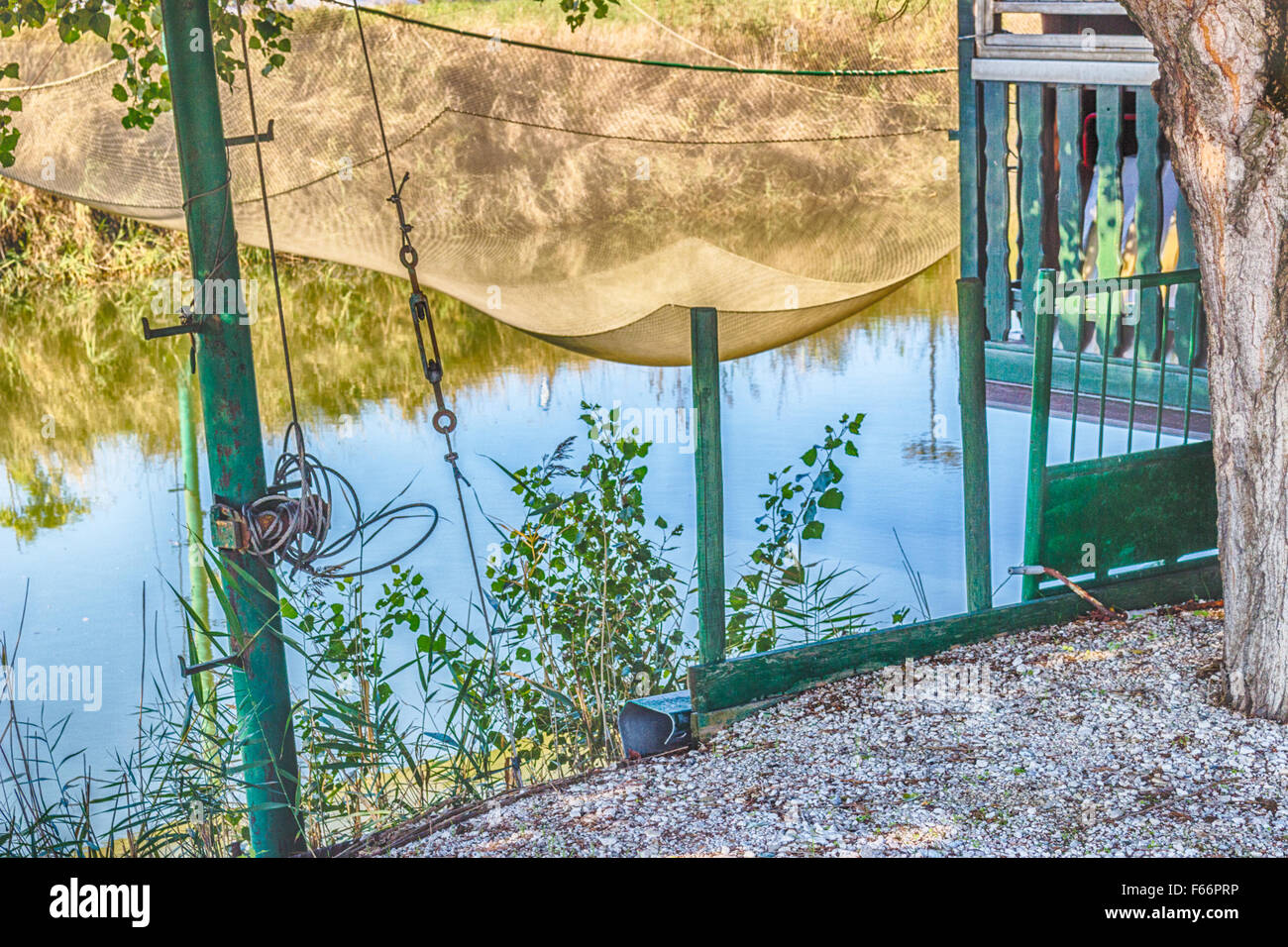 fishing hut with fishing net on hoist Stock Photo - Alamy