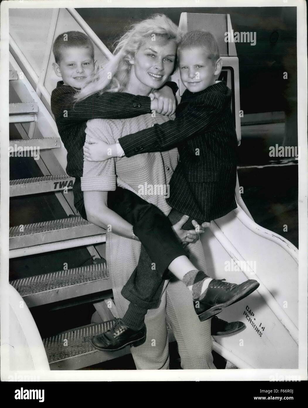 1958 - Irish McCulla, TV's Sheena, Carries her sons, Kim, 9, Left, And ...
