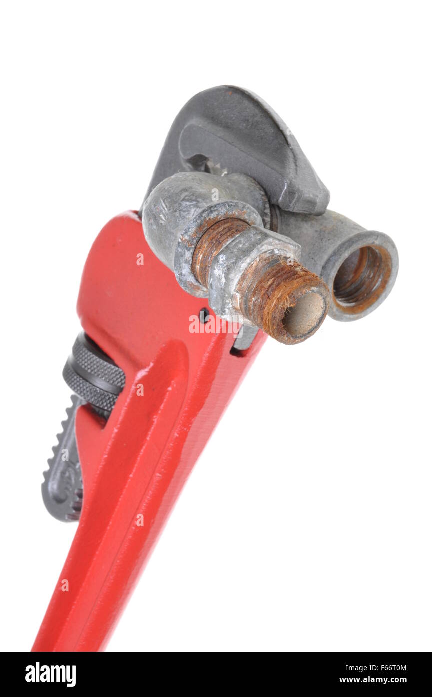 Red plumbers pipe wrench and plumbing component isolated on white ...