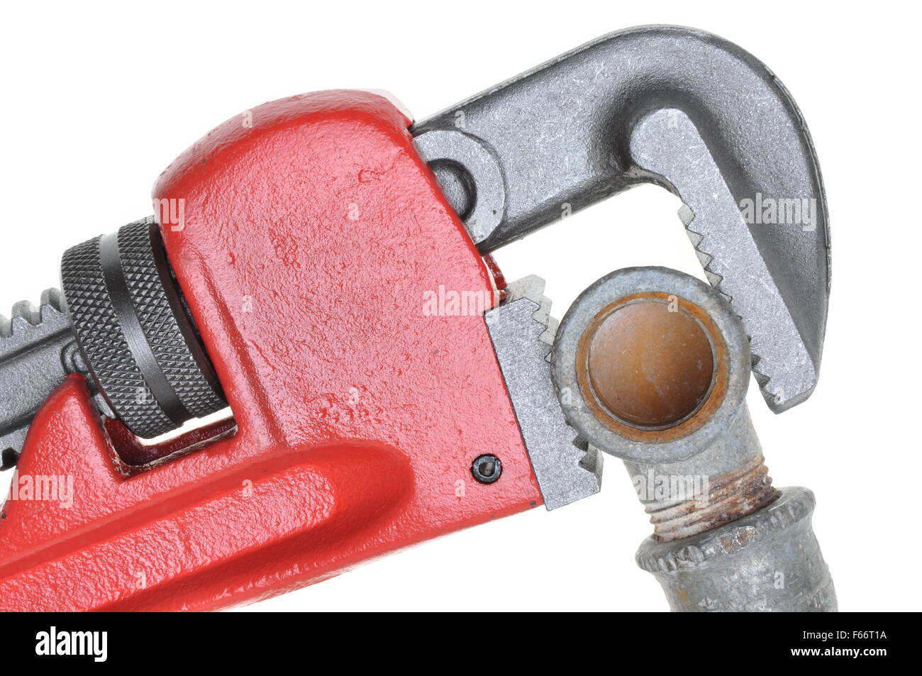 Red plumbers pipe wrench and plumbing component isolated on white ...