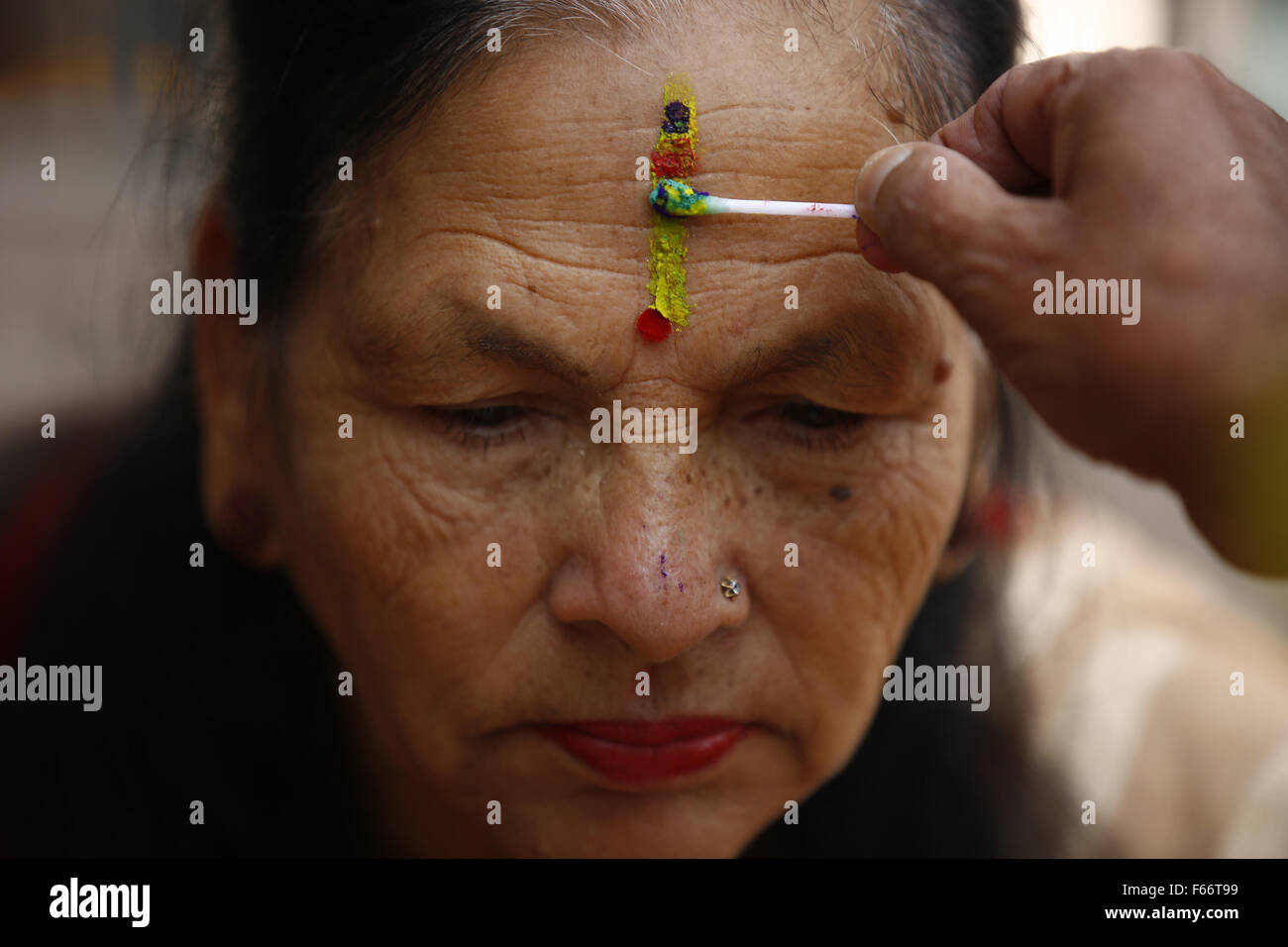 Kathmandu, Nepal. 13th November, 2015. Colourful ''tika'' which ...