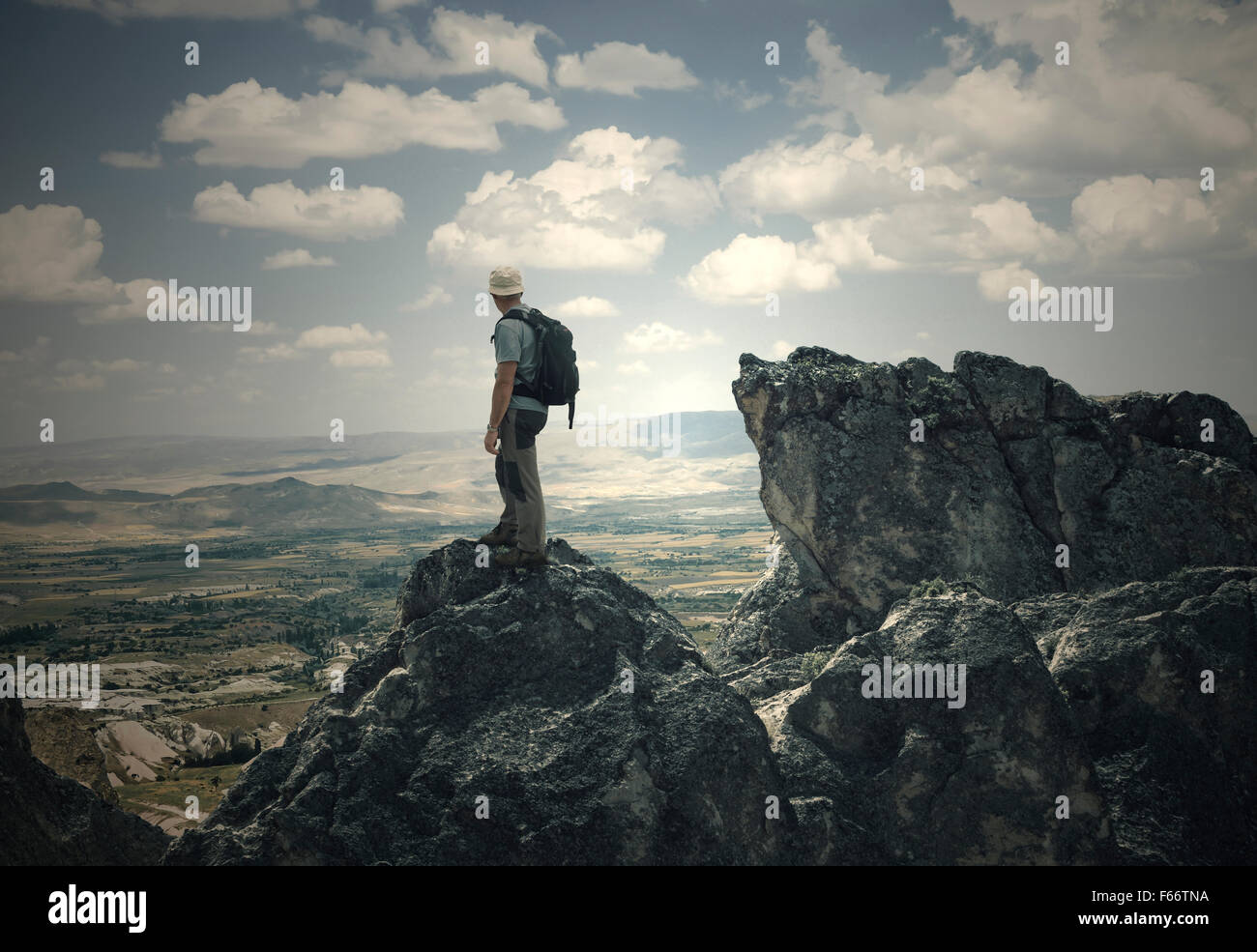 man on the High Peak Stock Photo - Alamy