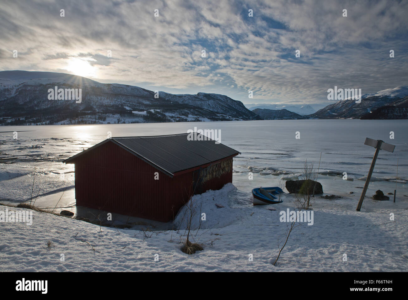 Shed with fish on the shore of the fjord Stock Photo - Alamy