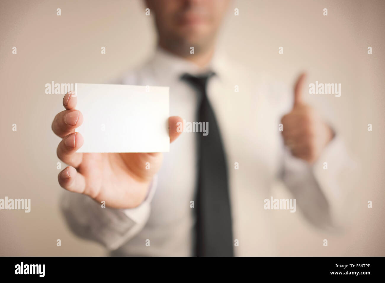 Blank Card holded by hand and thumbs up Stock Photo - Alamy