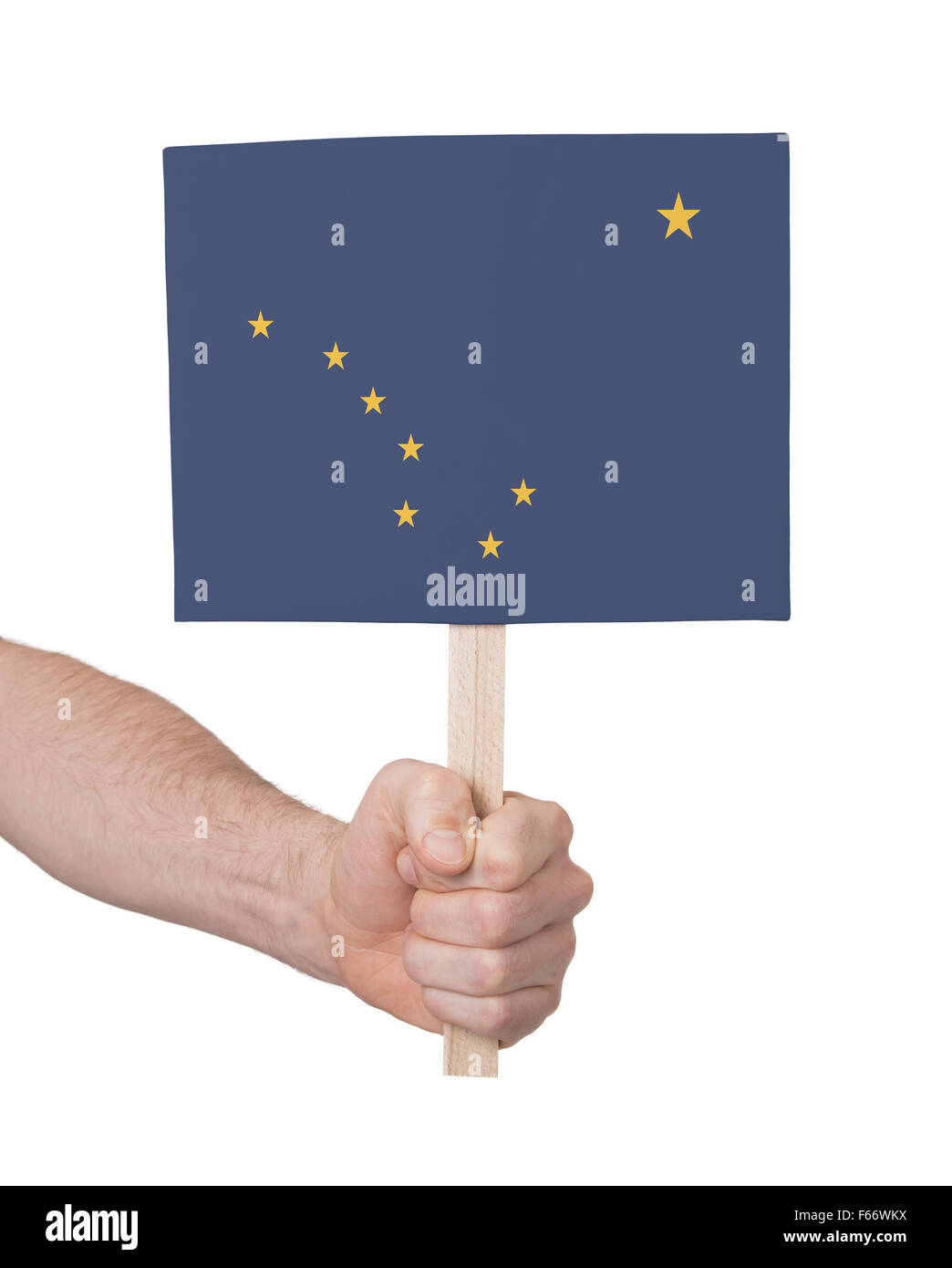 Hand holding small card, isolated on white - Flag of Alaska Stock Photo ...