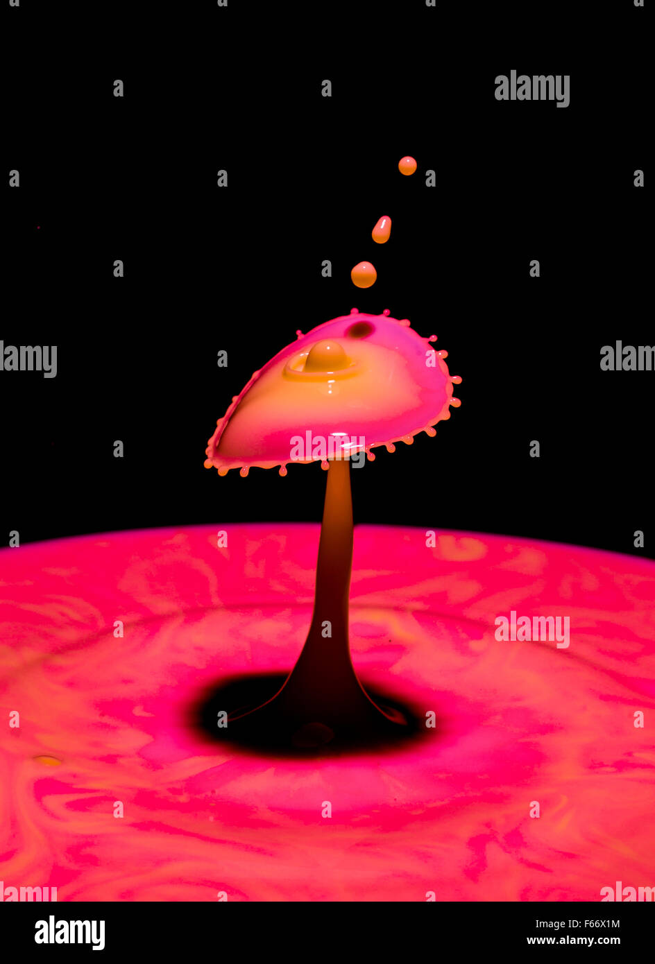 High speed flash photography of milk drops impacting Stock Photo - Alamy