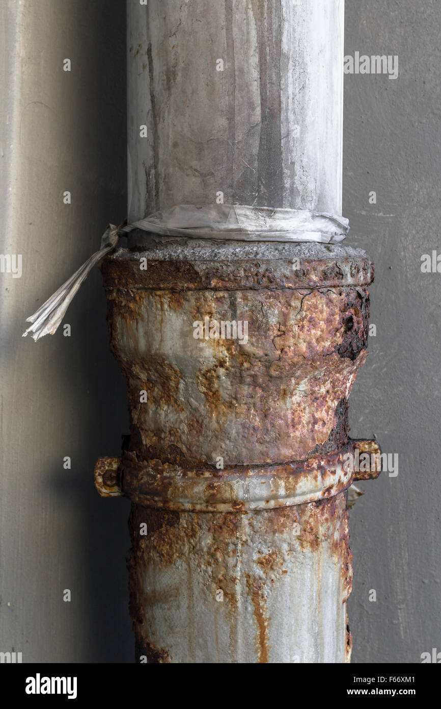 Details and particulars of a gutter invaded by rust Stock Photo - Alamy