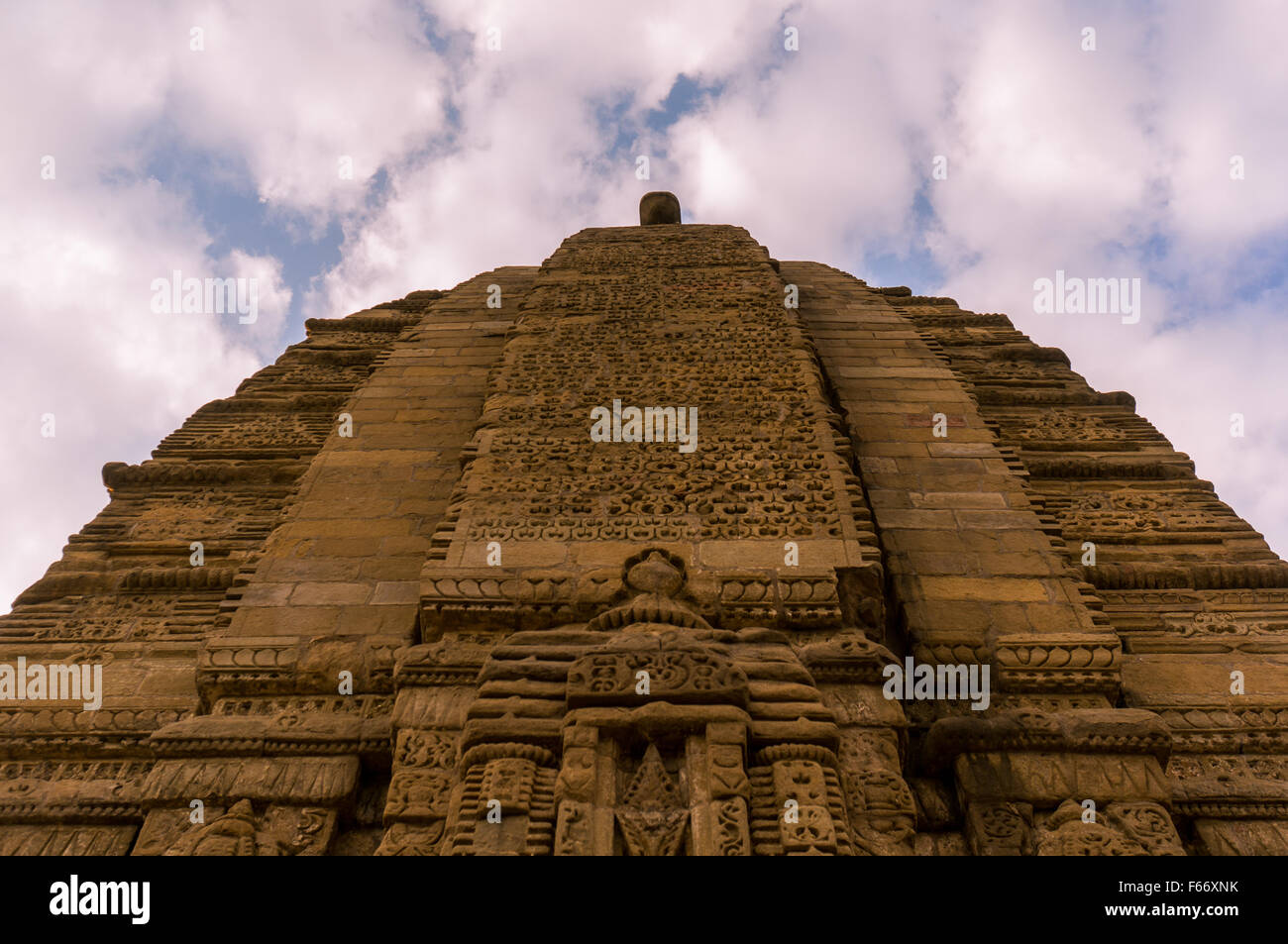 Spire and carvings of the ancient hindu temple dedicated to Shiva at ...