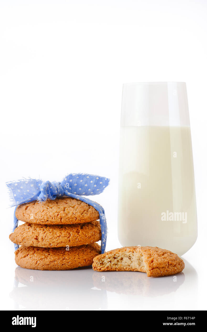 Stack of three homemade oatmeal cookies tied with blue ribbon in small ...