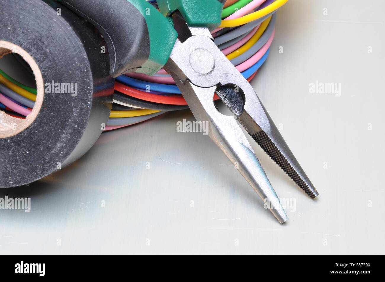 Electrical tools and cables on metal surface Stock Photo - Alamy
