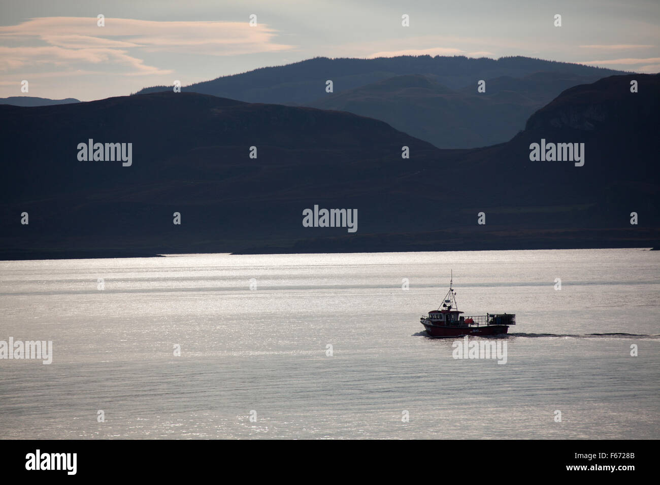 Firth of Lorn, Scotland. Picturesque silhouetted view of an Oban based ...