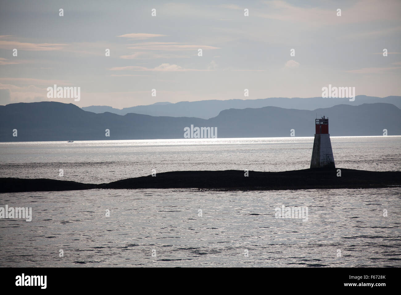 Firth of Lorn, Scotland. Picturesque silhouetted view of Lady’s Rock ...