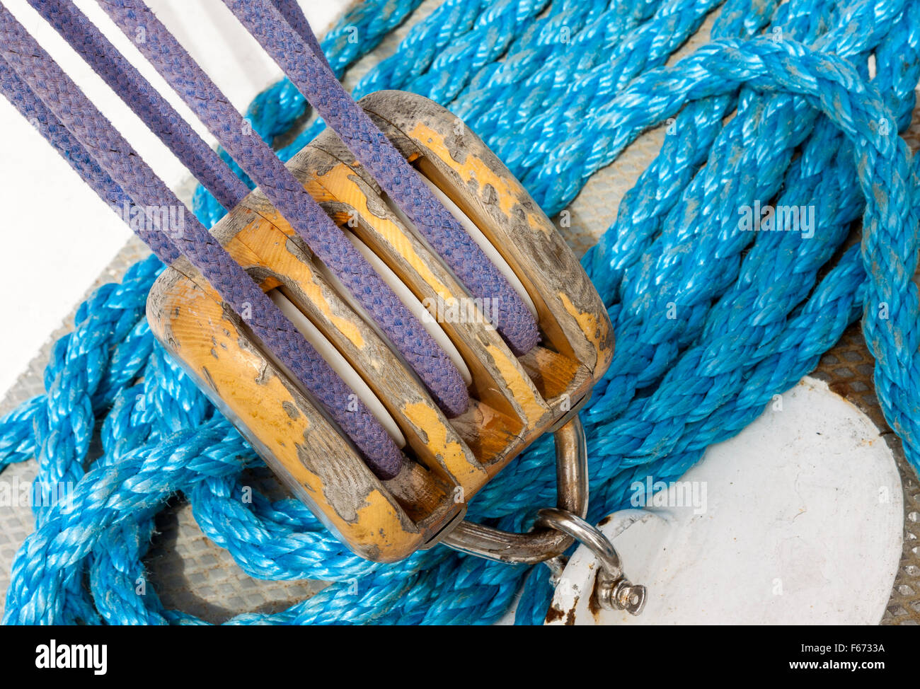 Closeup of marine ropes and old wooden ship tackle Stock Photo - Alamy