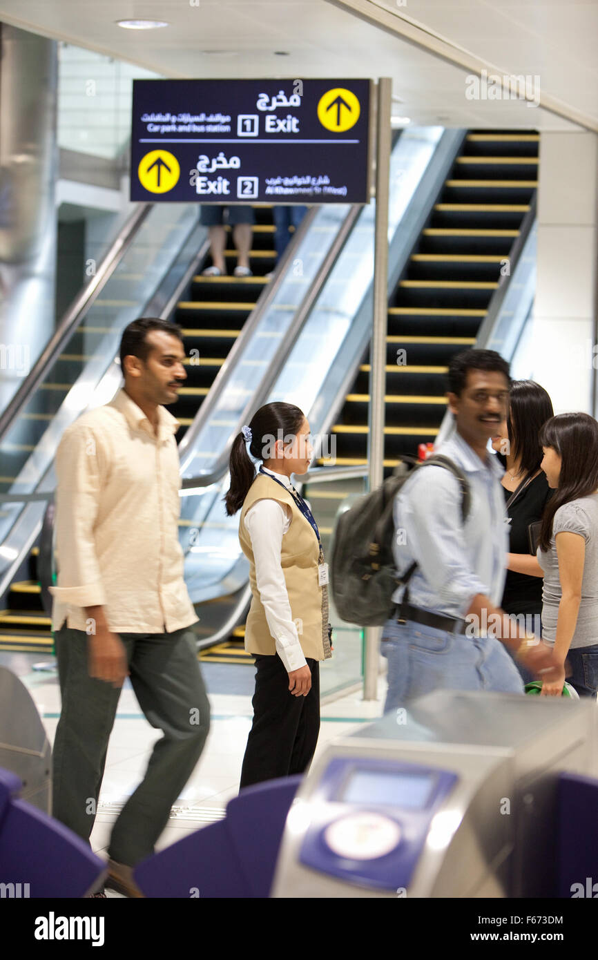 Station staff assist the public in the Dubai Metro Stock Photo - Alamy