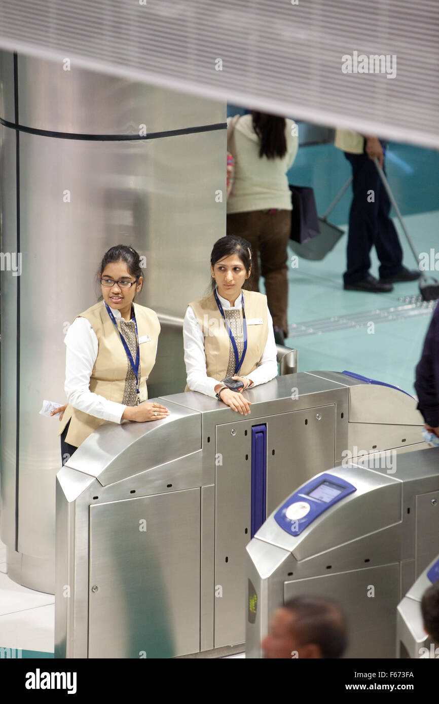Dubai Metro station staff attending to the public Stock Photo - Alamy
