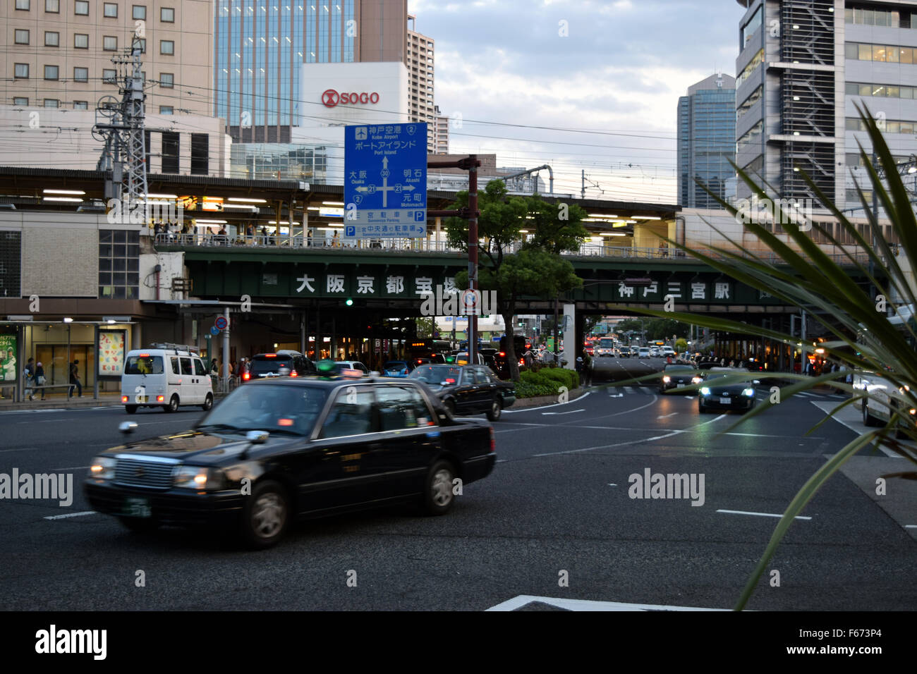 Image shows a busy fast pace Japanese city center Stock Photo - Alamy