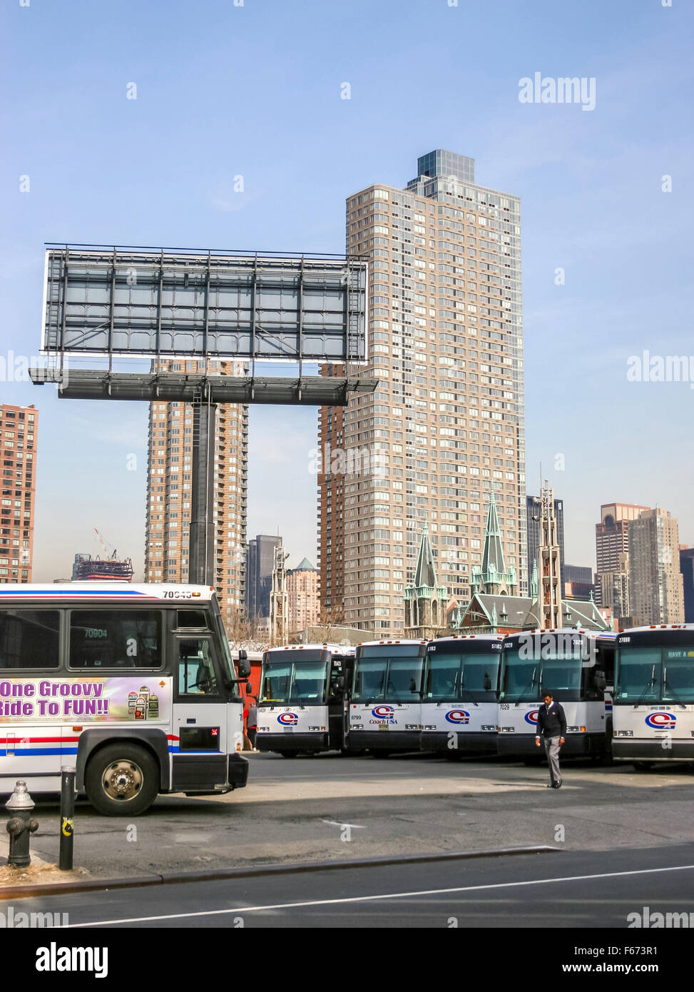 A large group of buses parked in the city bus garage on West 38 street ...
