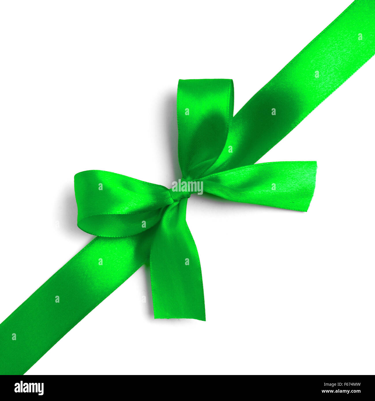 Shiny green satin ribbon on white background Stock Photo - Alamy