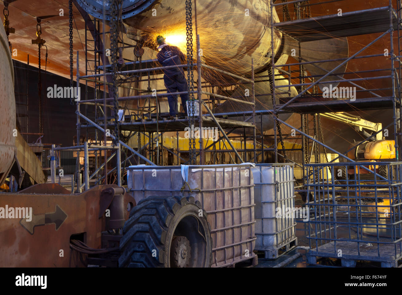 Men at work during dry dock Stock Photo - Alamy