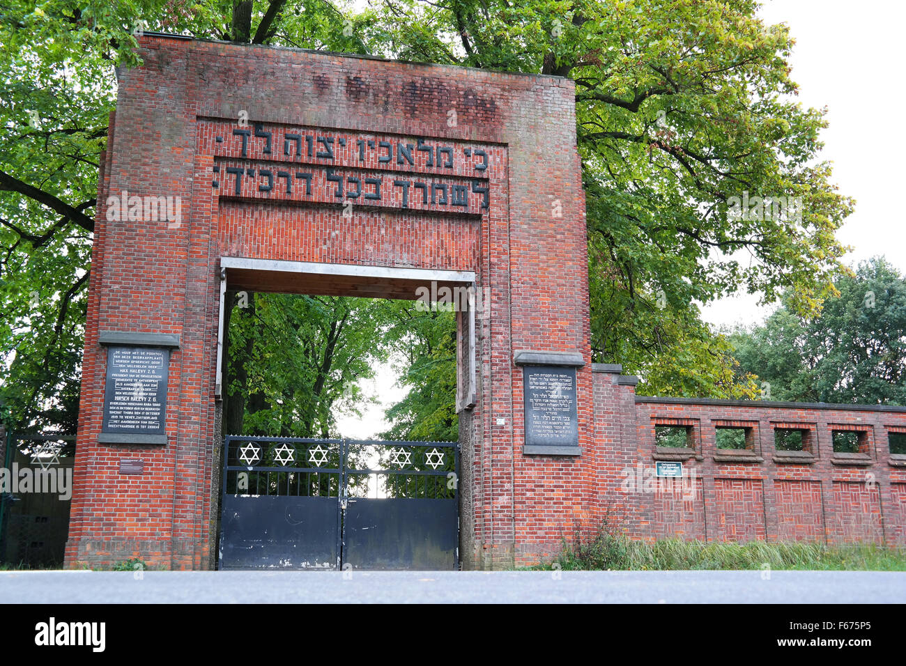 Gate of one of the three extensive Jewish cemeteries with many graves ...