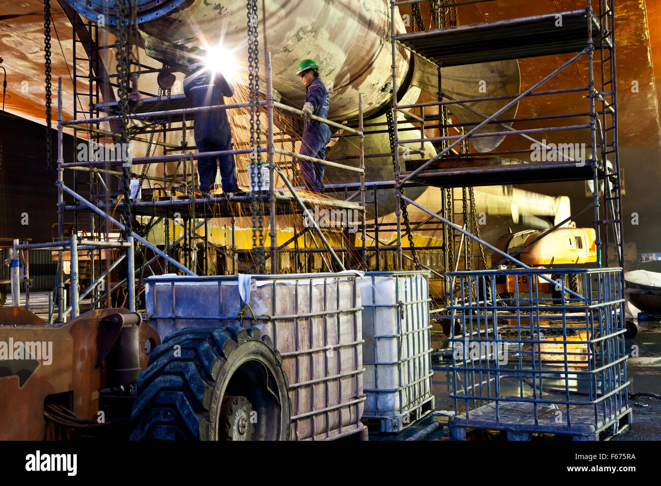 Men at work during dry dock Stock Photo - Alamy