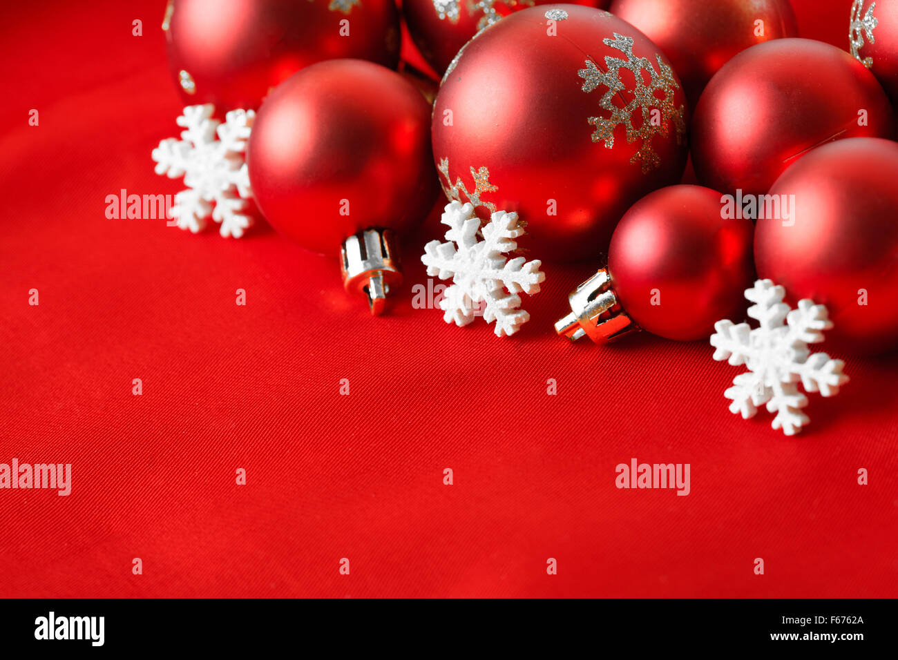 red Christmas balls, wrapped in cloth Stock Photo - Alamy