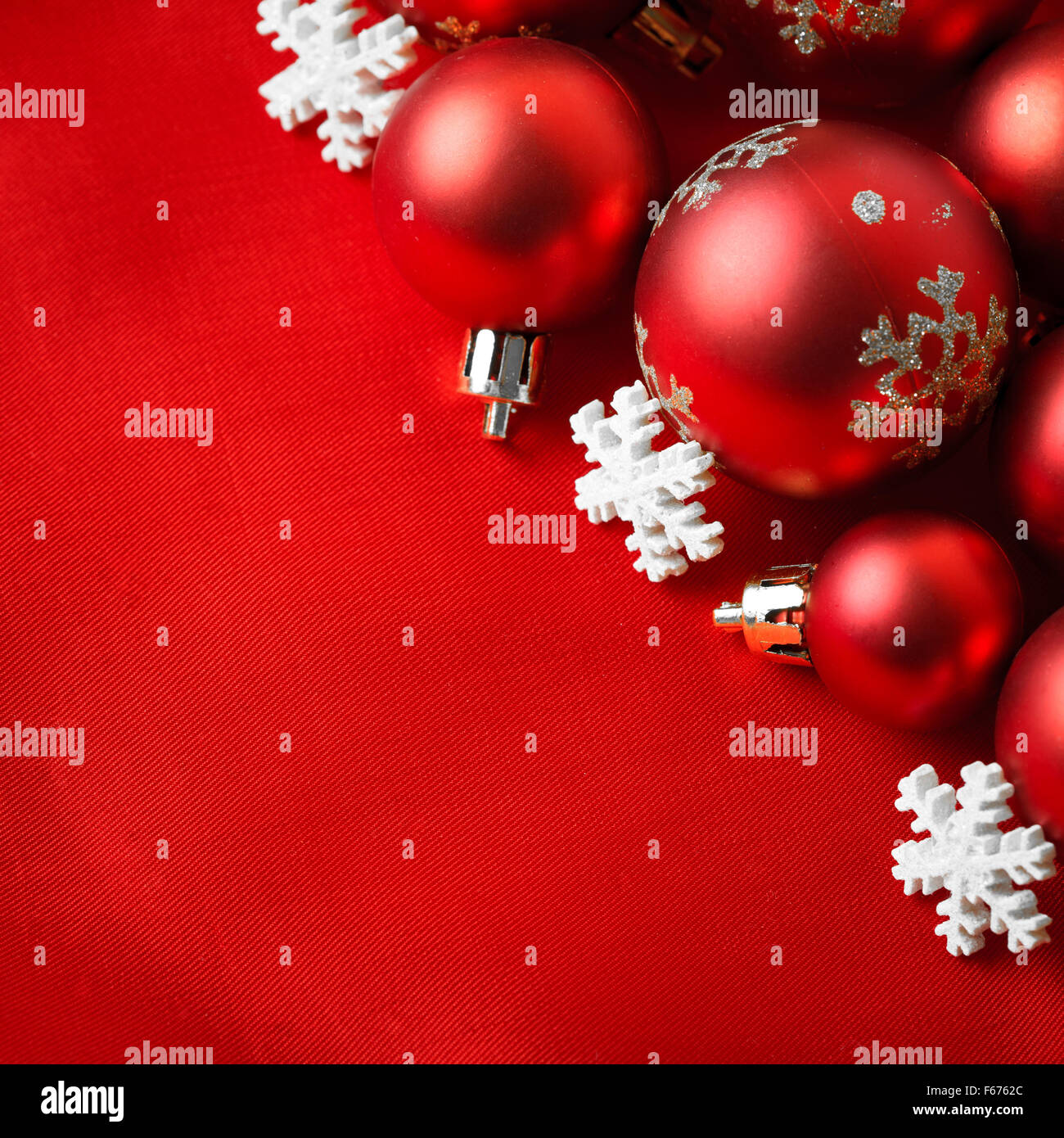 red Christmas balls, wrapped in cloth Stock Photo - Alamy