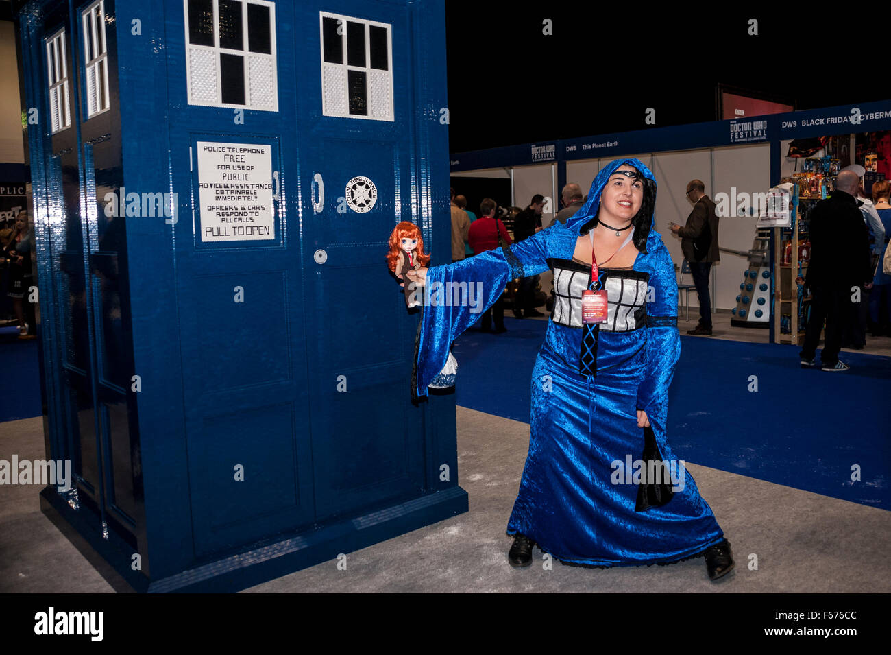 London, UK. 13 November 2015. A woman in a Tardis costume poses next to ...