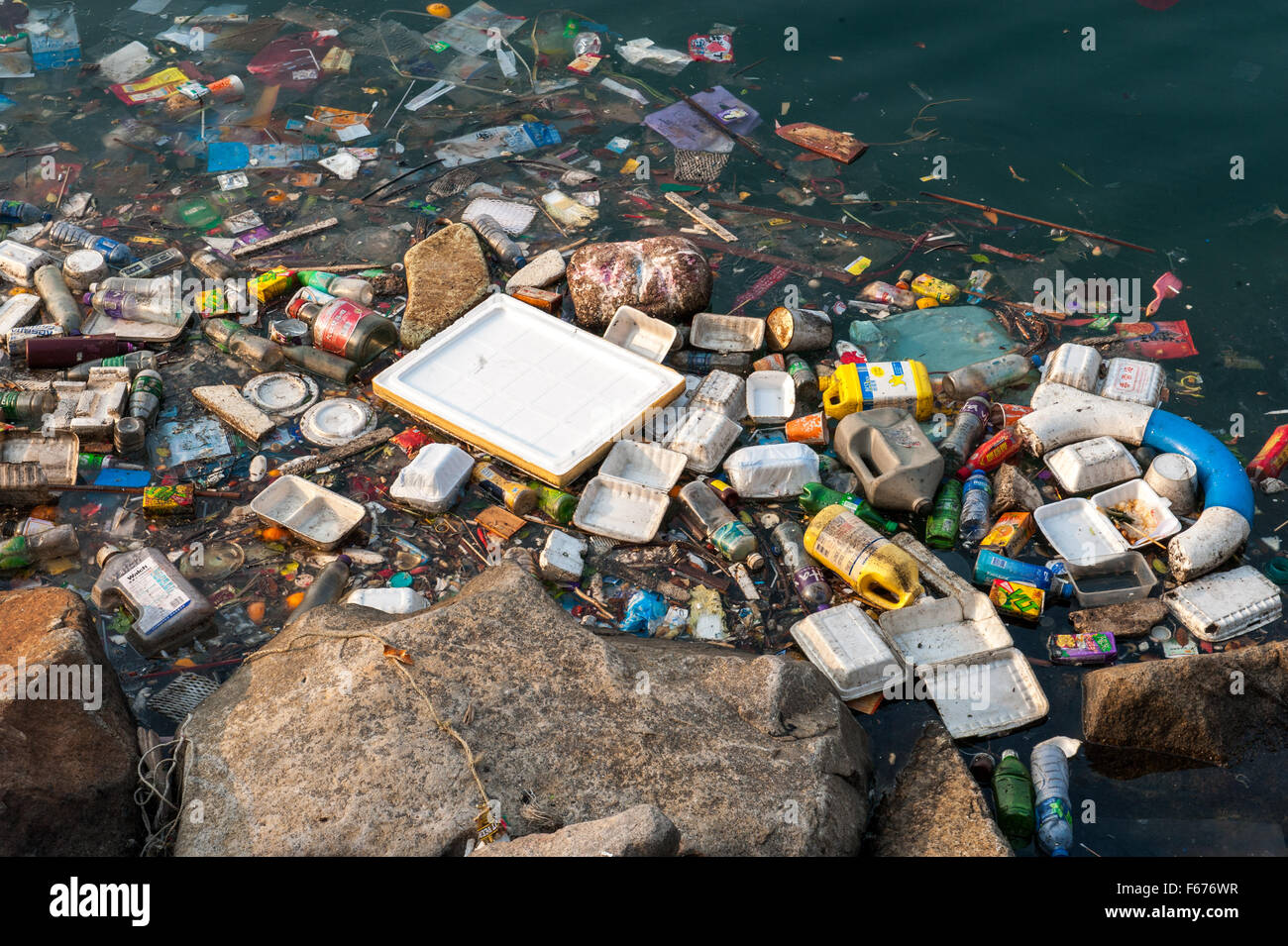 Man made pollution in water Stock Photo - Alamy