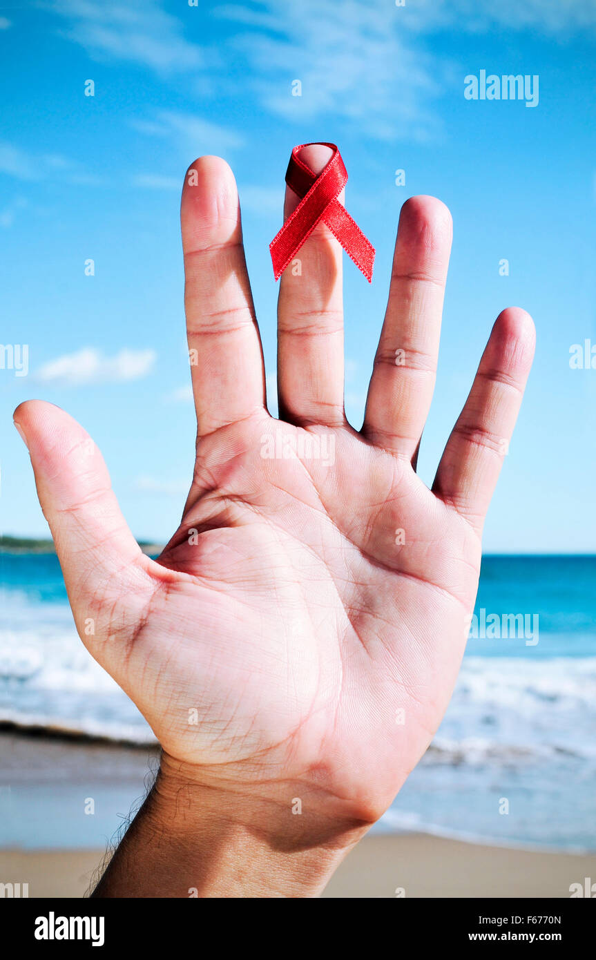 Fingers with ribbon hi-res stock photography and images - Alamy