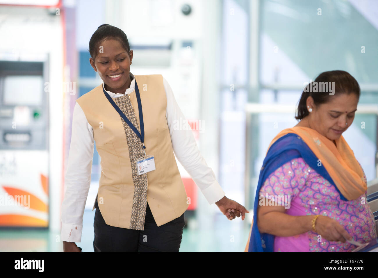 Staff assistance in the Dubai Metro Stock Photo - Alamy