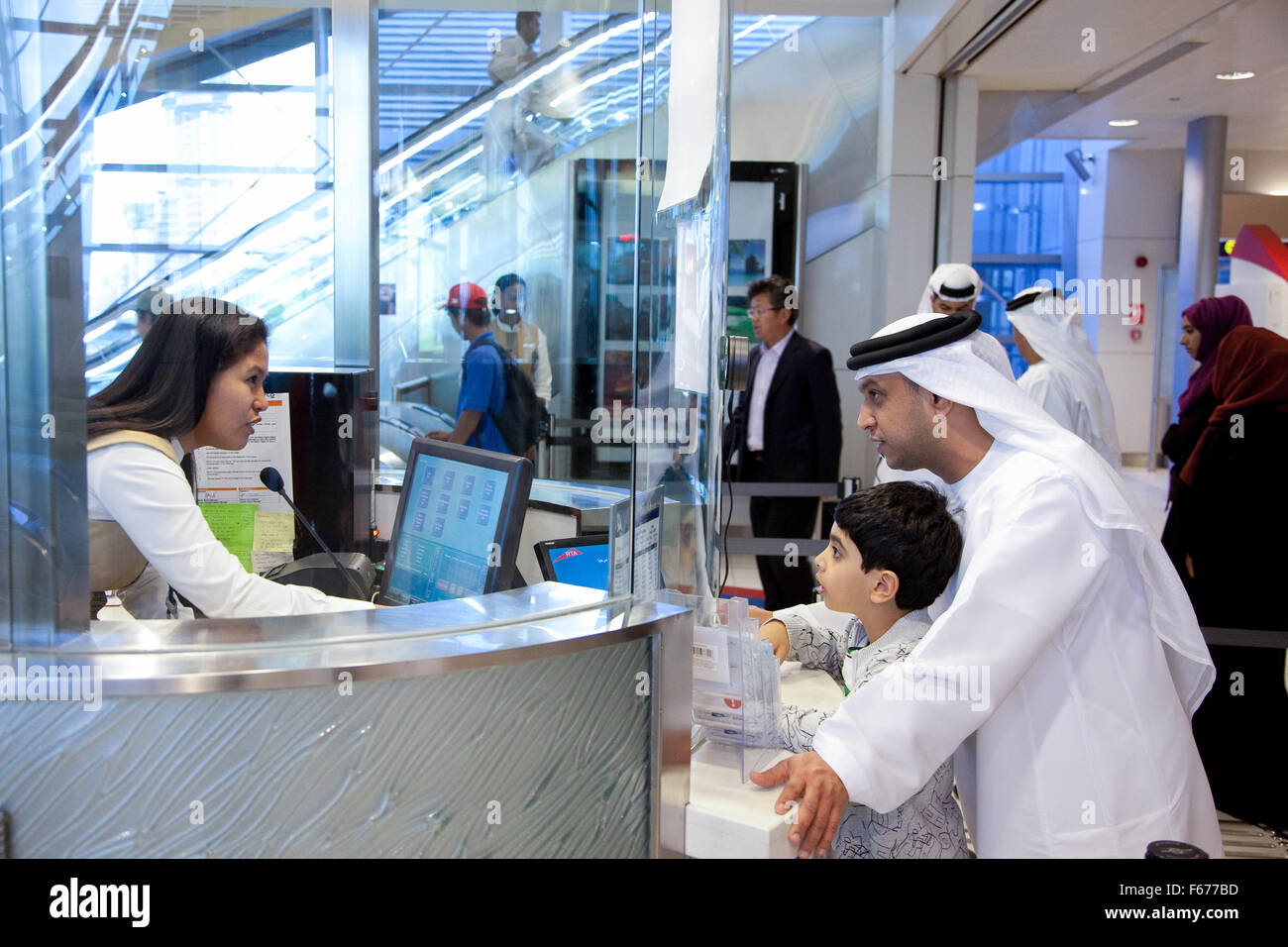 Staff assistance in the Dubai Metro Stock Photo - Alamy