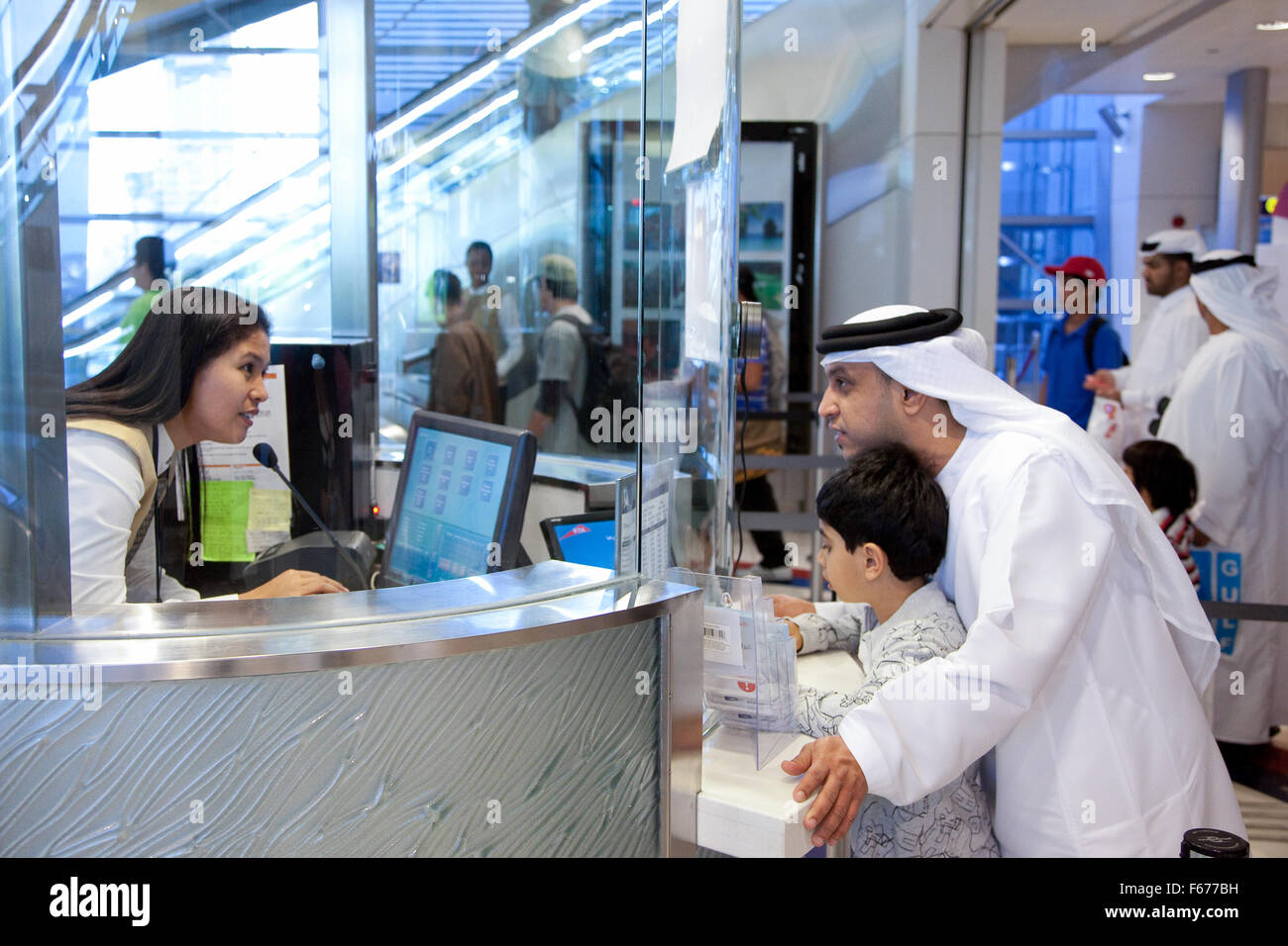 Staff assistance in the Dubai Metro Stock Photo - Alamy
